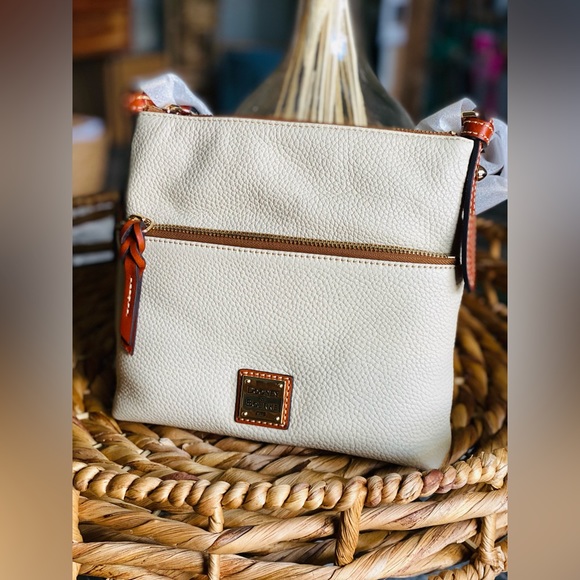 Dooney & Bourke | Bags | Dooney Bourke Pebble Grain Leather Carrier ...